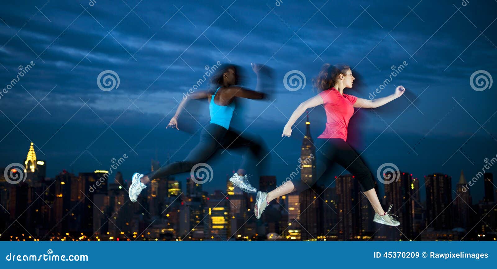 Two Young Women Jogging through the Night of New York Stock Image ...