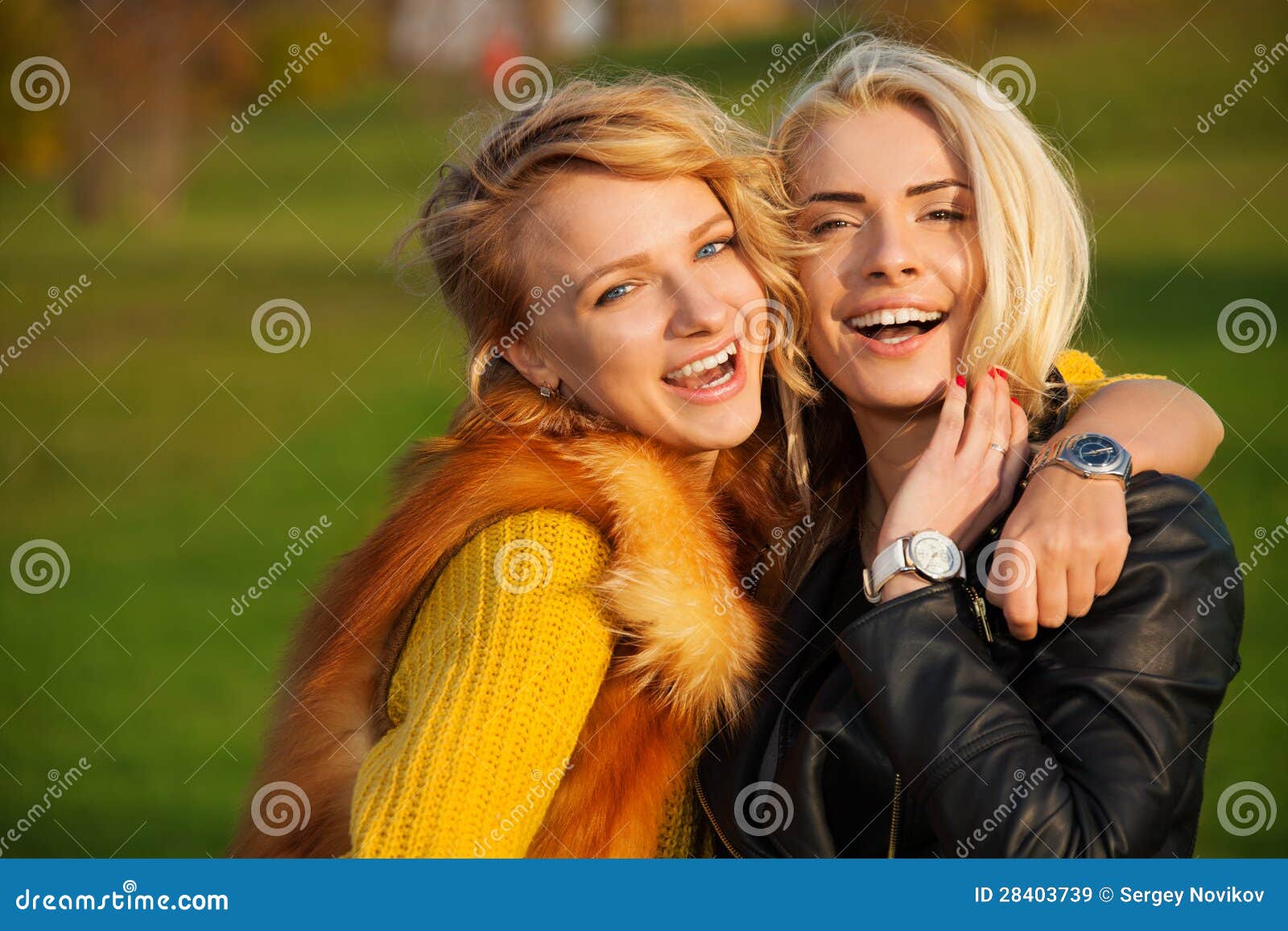 Two Young Women Laughing in the Park Stock Image - Image of laughing ...