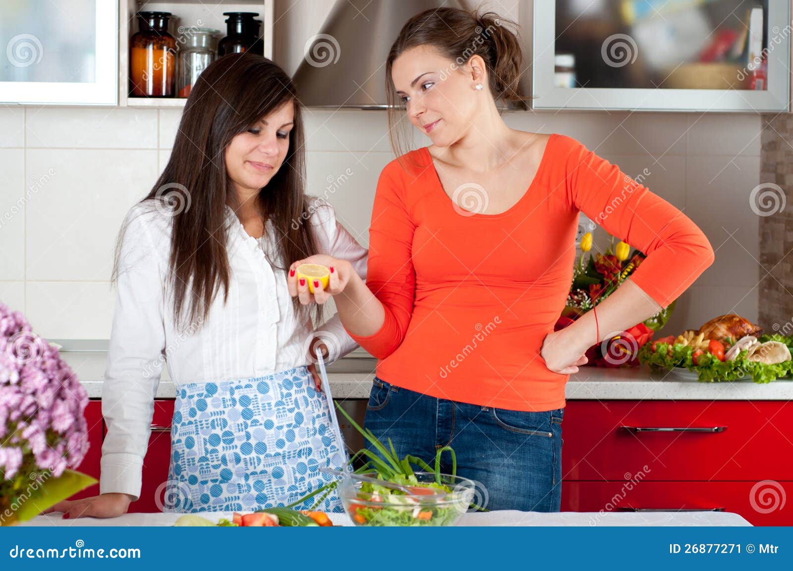 Two Young Women in Modern Kitchen Stock Image - Image of green ...