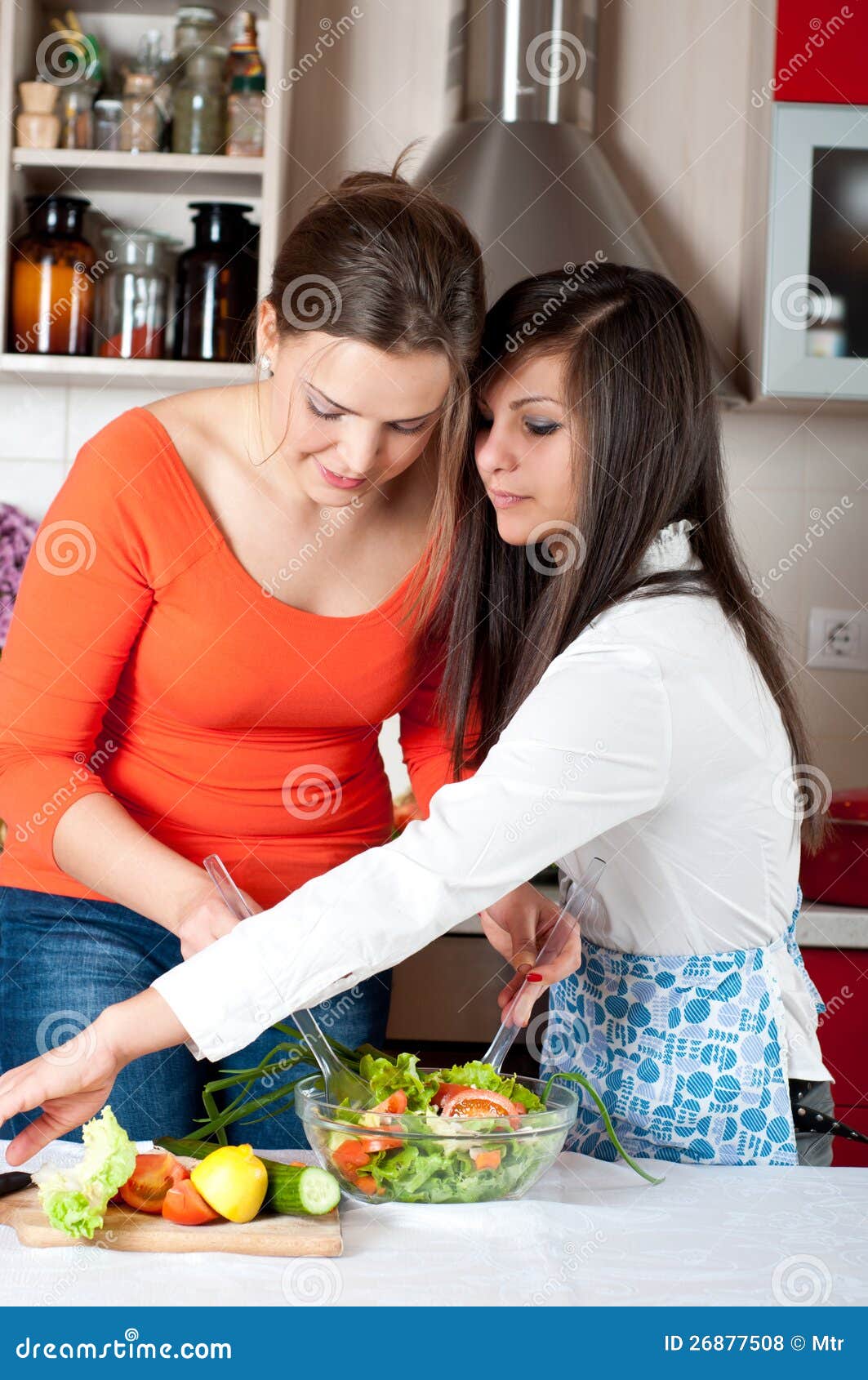 Two Young Women in Modern Kitchen Stock Photo - Image of flower, casual ...