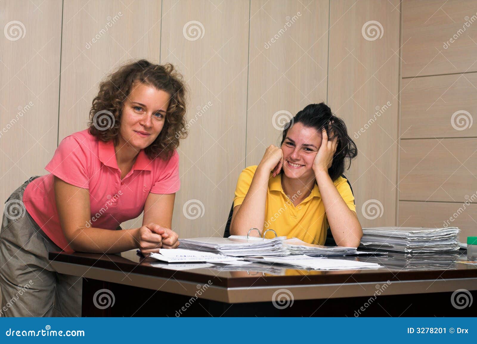 Two young women in office stock image. Image of people - 3278201