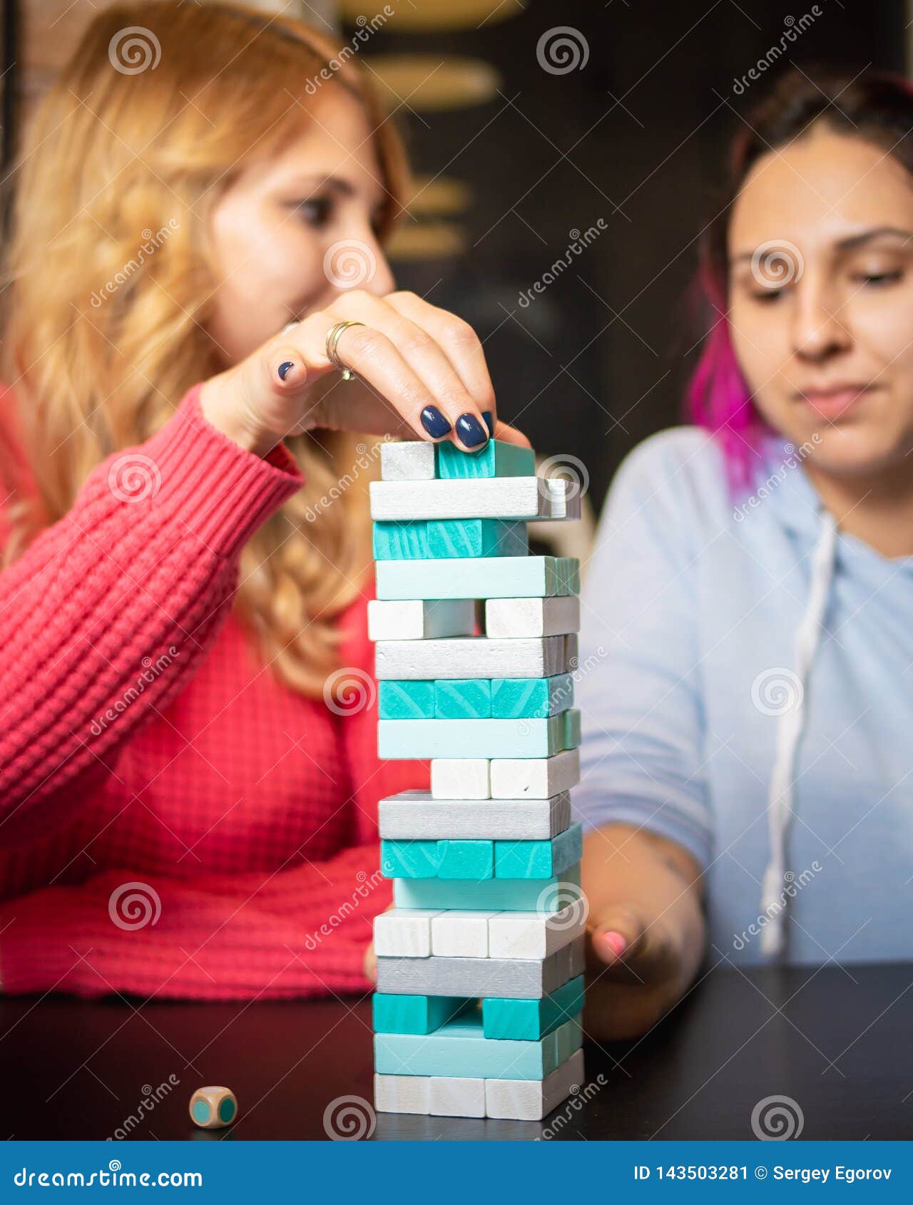 Two Young Women Playing Colored Jenga Stock Image - Image of attractive ...