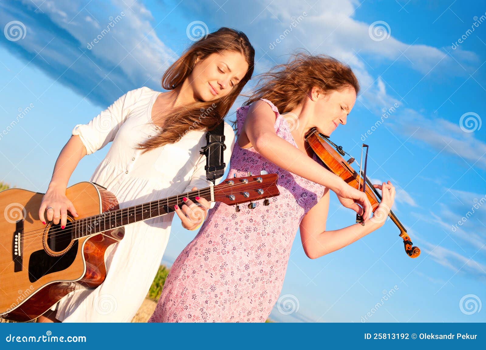 Two Young Women Playing Guitar Stock Photo - Image of summer ...