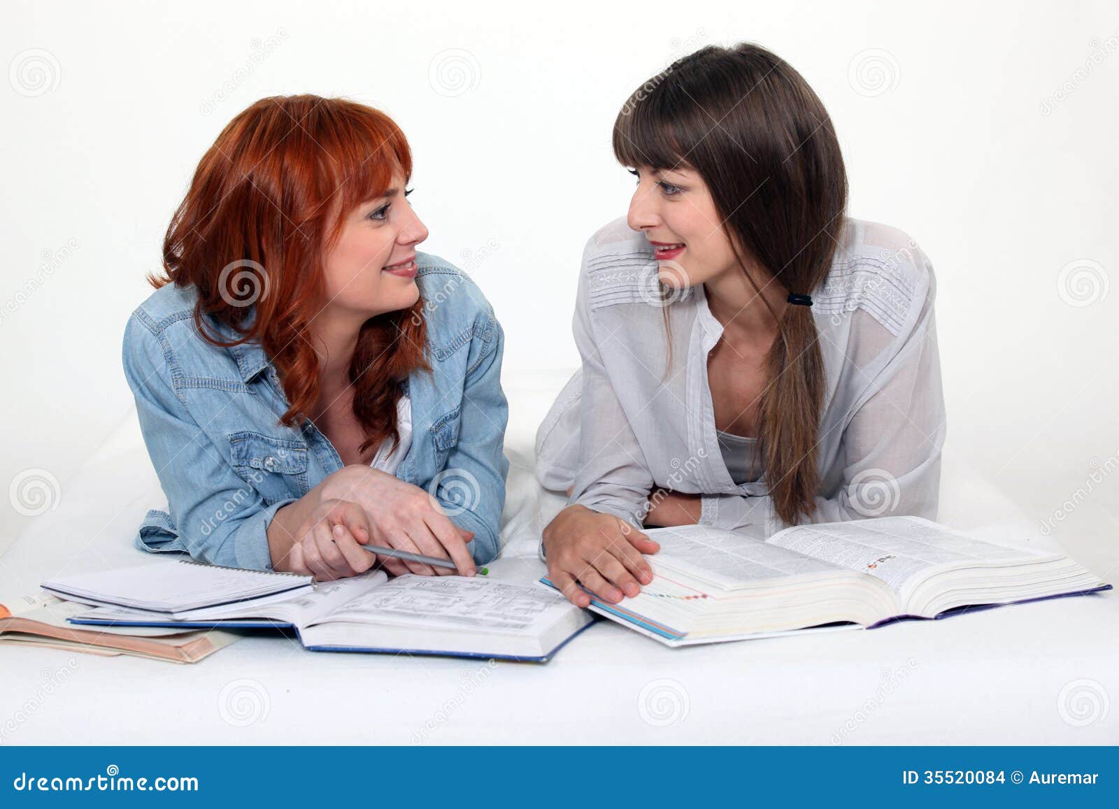 Two young women studying stock photo. Image of pretty - 35520084