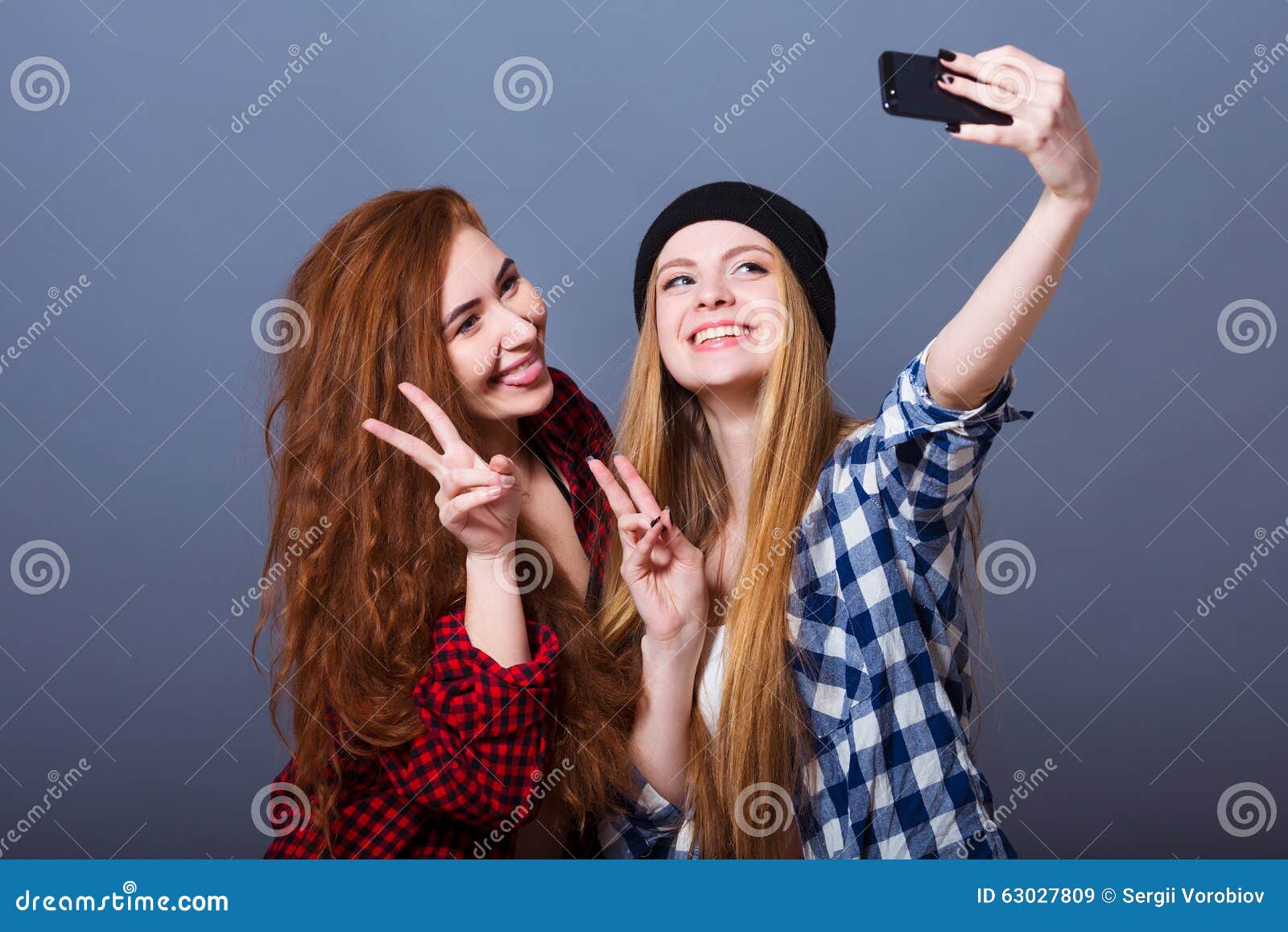 Two Young Women Taking Selfie With Mobile Phone Stock Image Image Of