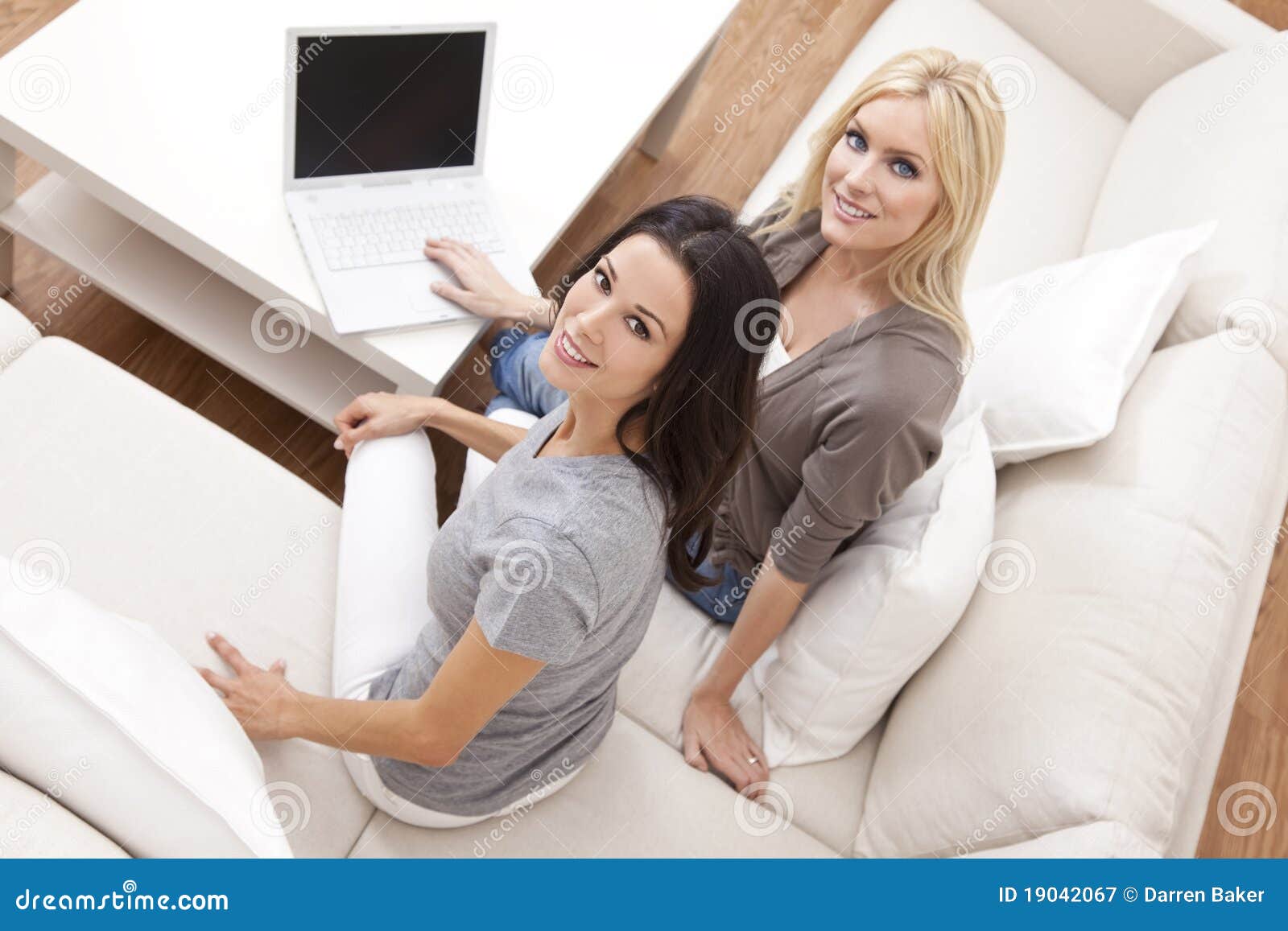 Two Young Women Using Laptop Computer at Home Stock Image - Image of ...