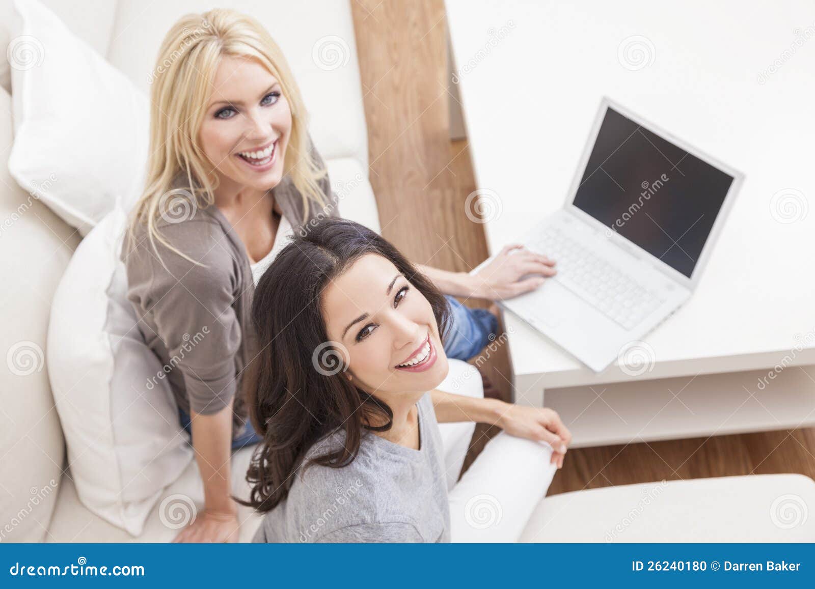 Two Young Women Using Laptop Computer Home Sofa Stock Photo - Image of ...