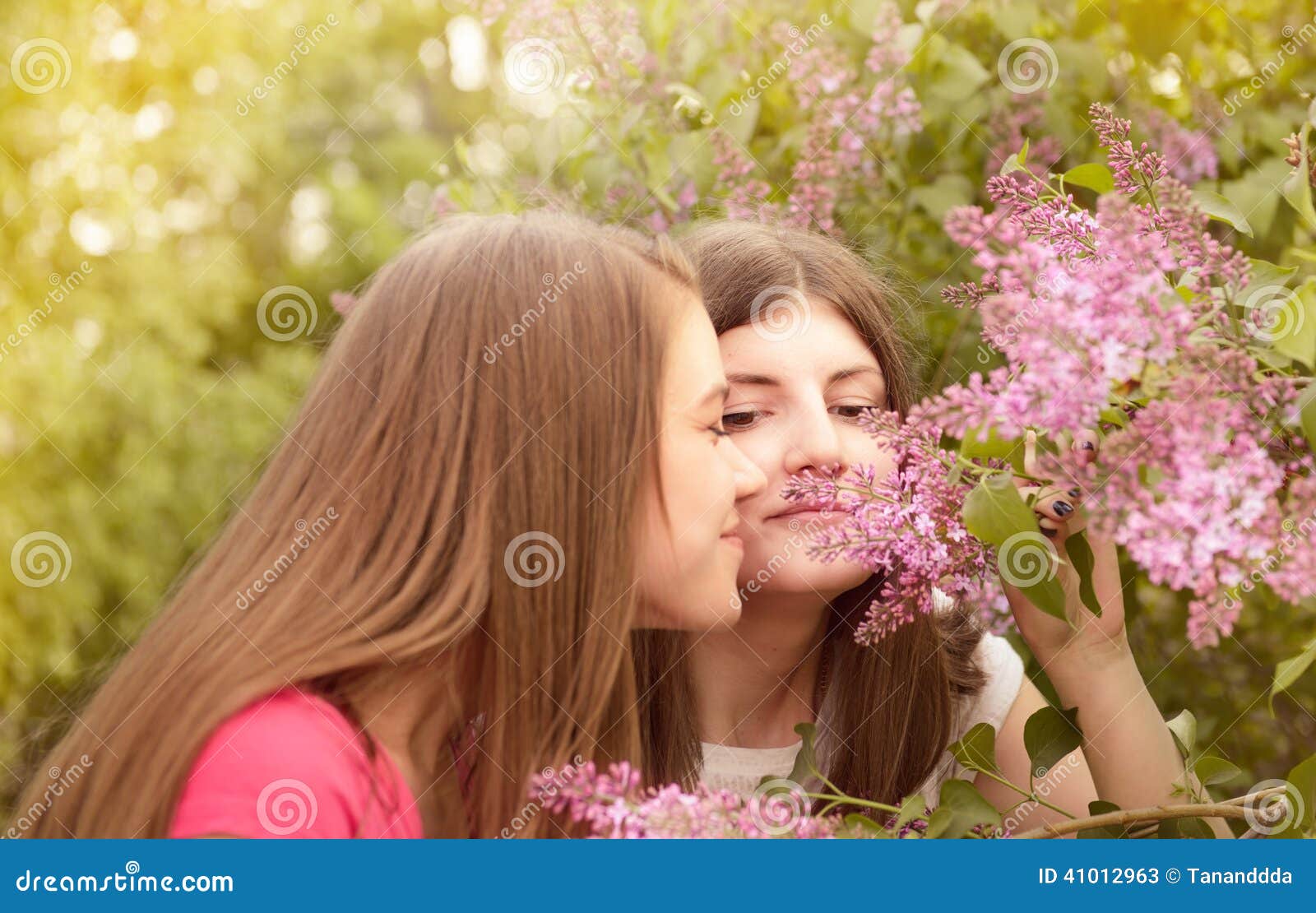 Two Young Women Walking Outside in a Park Stock Image - Image of ...