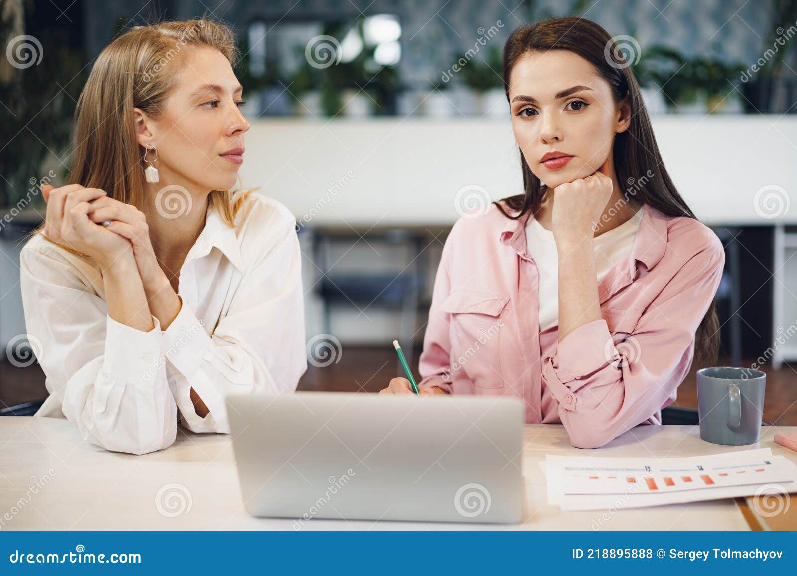 Two Young Women Working Together in Office Stock Photo - Image of ...