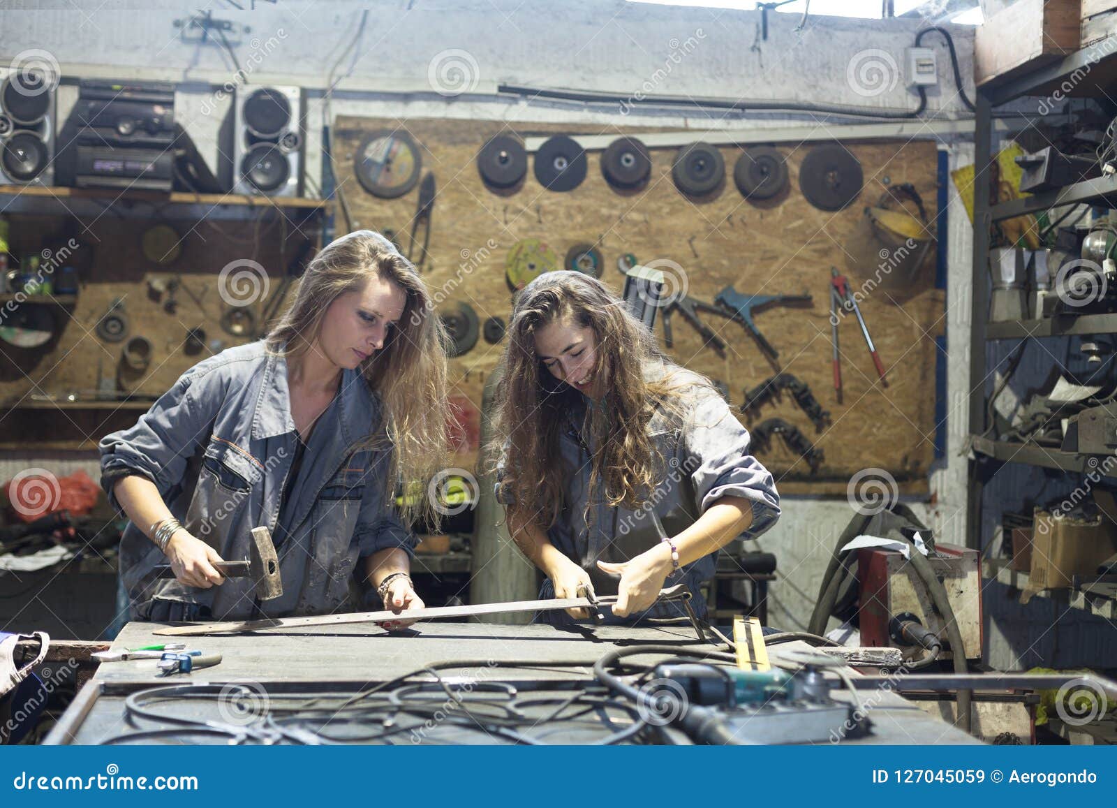 Two Women Working in Workshop Stock Image - Image of indoors, blonde ...