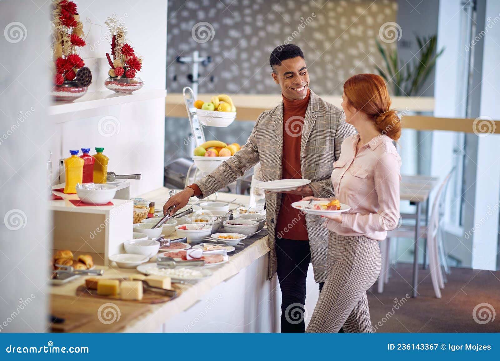Two Young Work Colleagues Having Breakfast Together Stock Image - Image ...