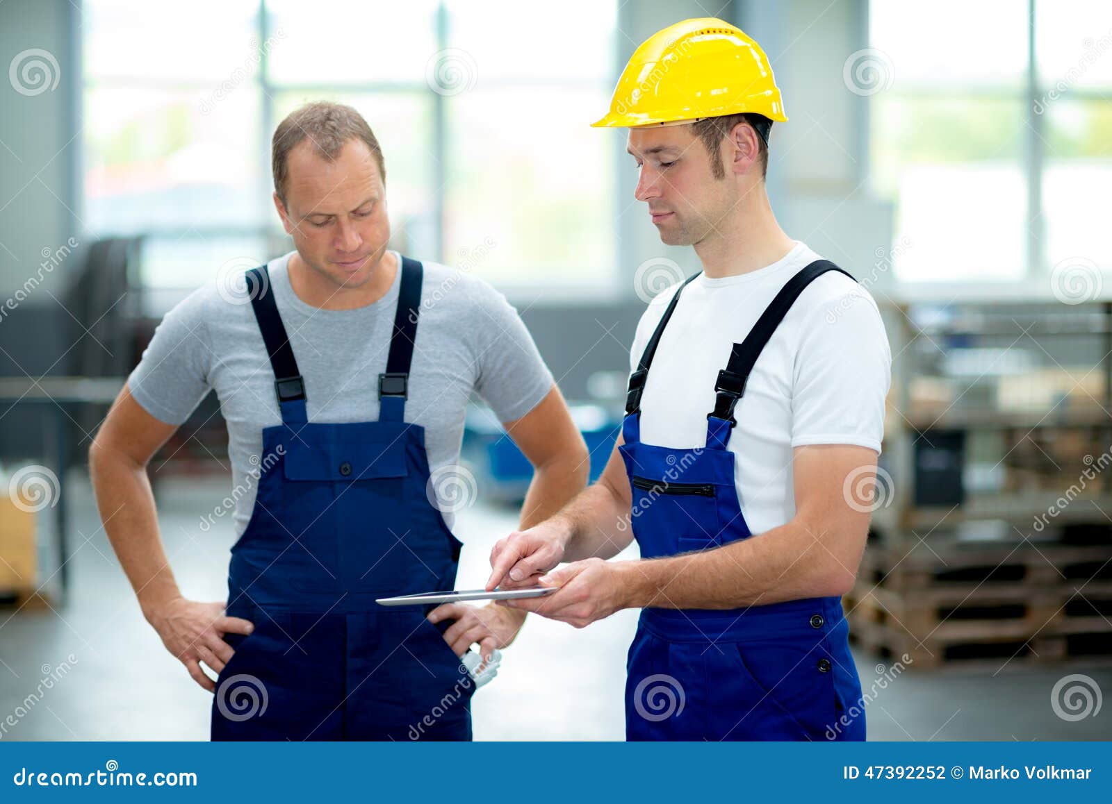 Two Young Worker in Factory Stock Photo - Image of person, occupation ...
