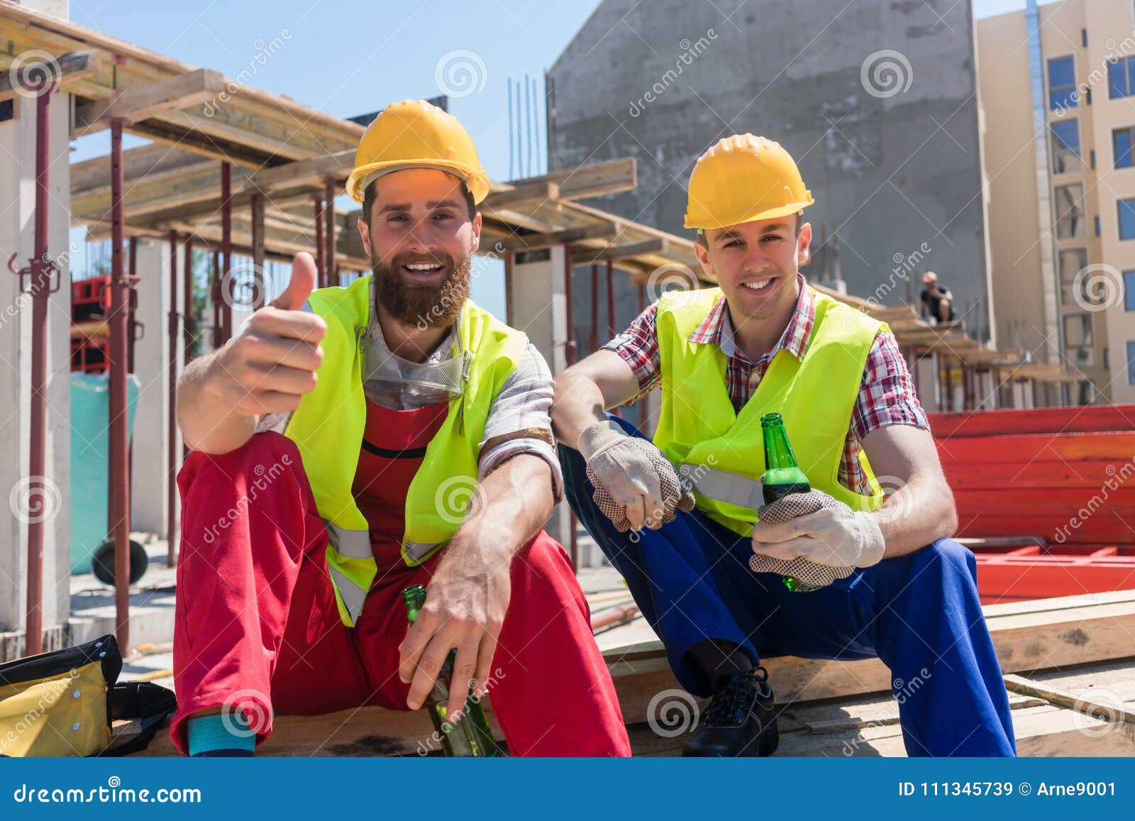 Two Young Workers Drinking a Cold Beer during Break at Work Stock Image ...
