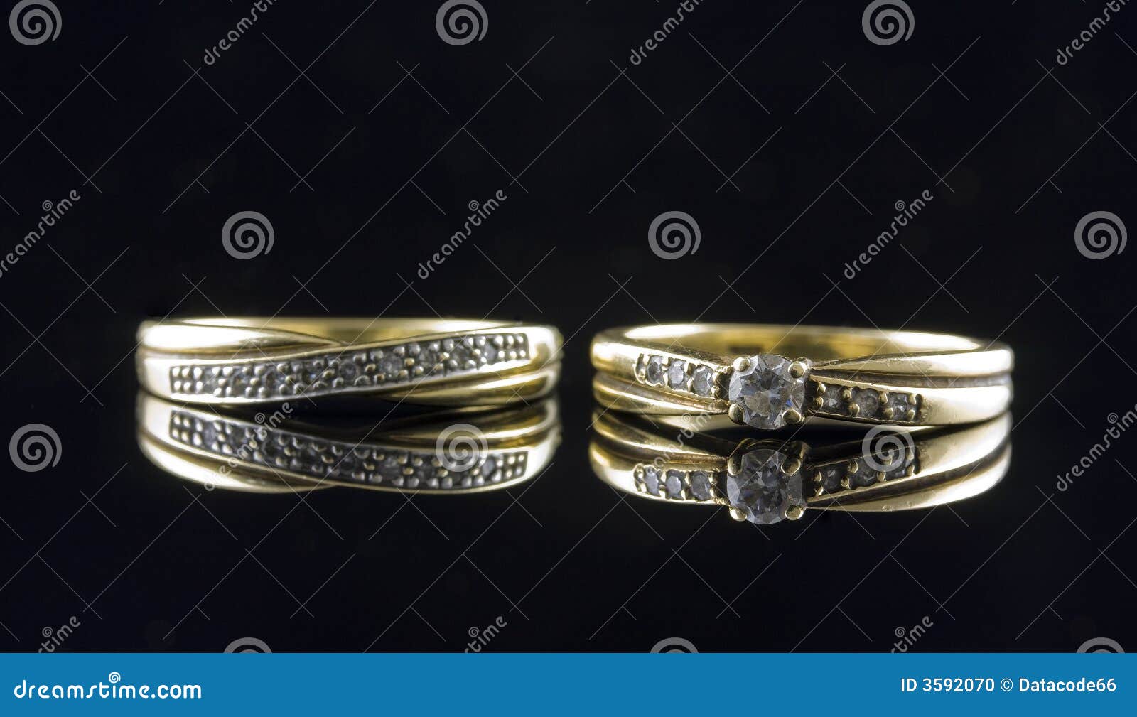 Twogold rings with gems stock photo. Image of black, shiny - 3592070