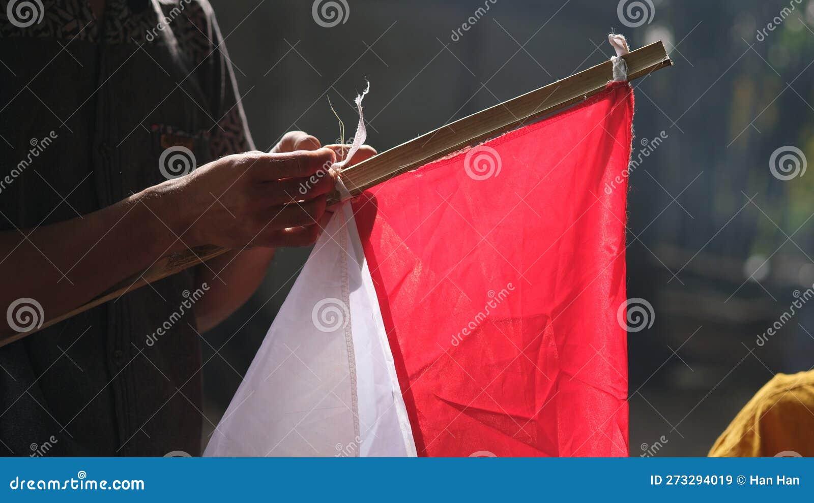 Tying an Indonesia Flag on a Bamboo Pole. Stock Image - Image of ...