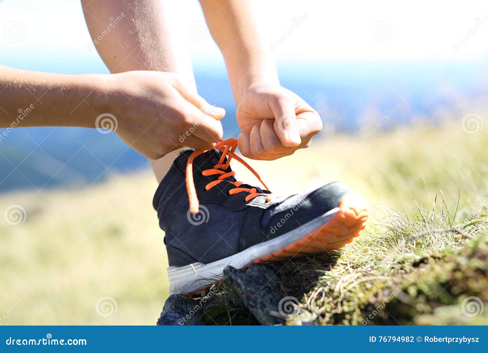 Tying shoelaces. stock photo. Image of shoe, binding - 76794982