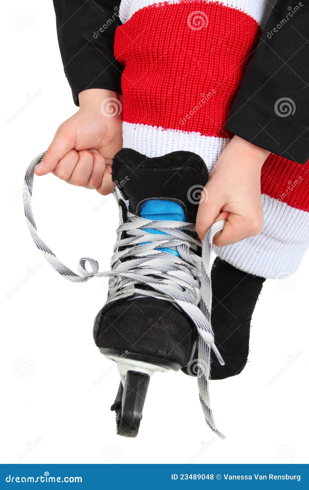 Tying skates stock photo. Image of person, caucasian - 23489048