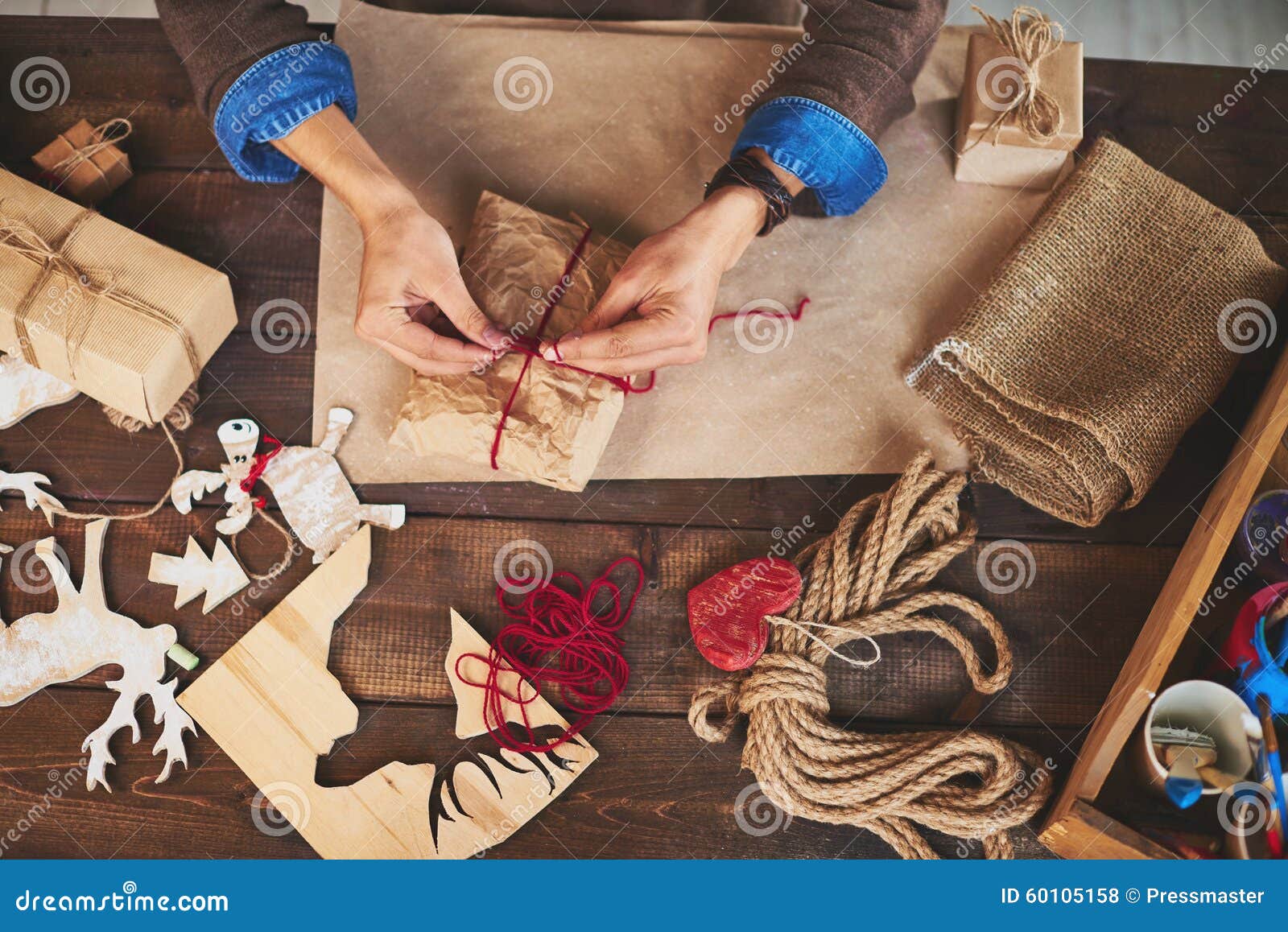 Tying Up Package with Thread Stock Photo - Image of deer, tying: 60105158