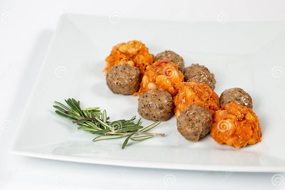 Types of Meatballs on a White Plate on the White Background Stock Photo ...