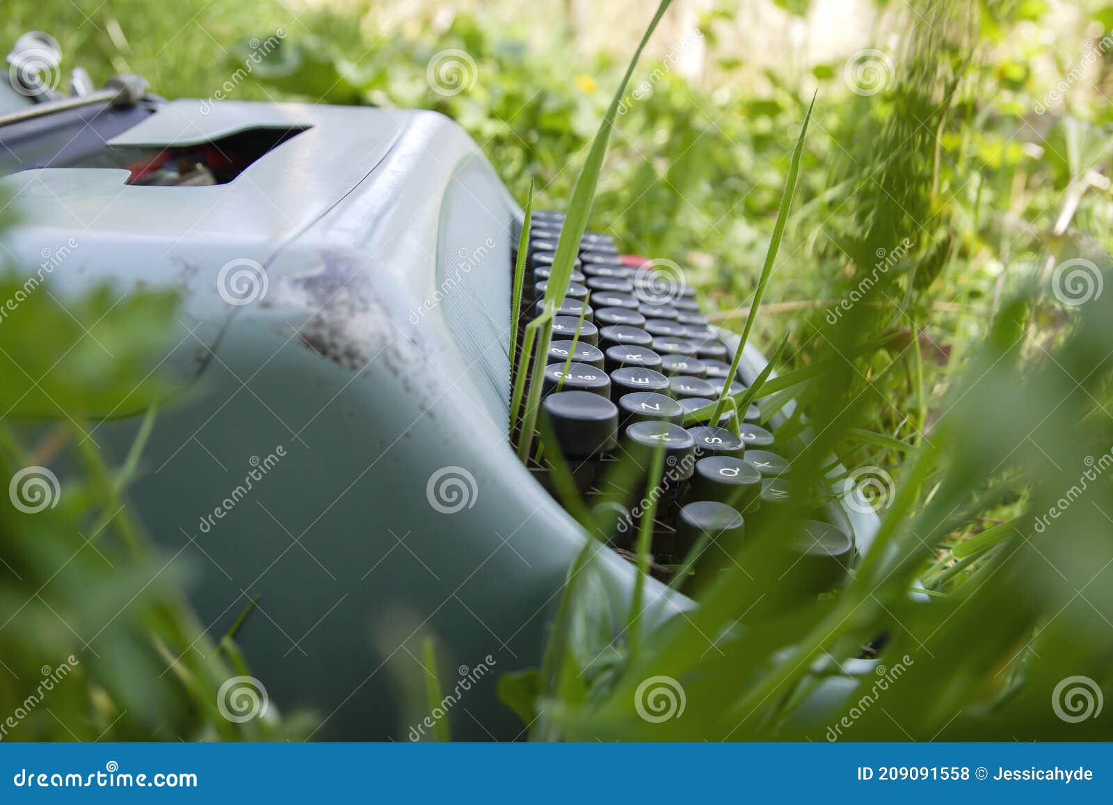 Typewriter in dumping site stock photo. Image of pastel - 209091558