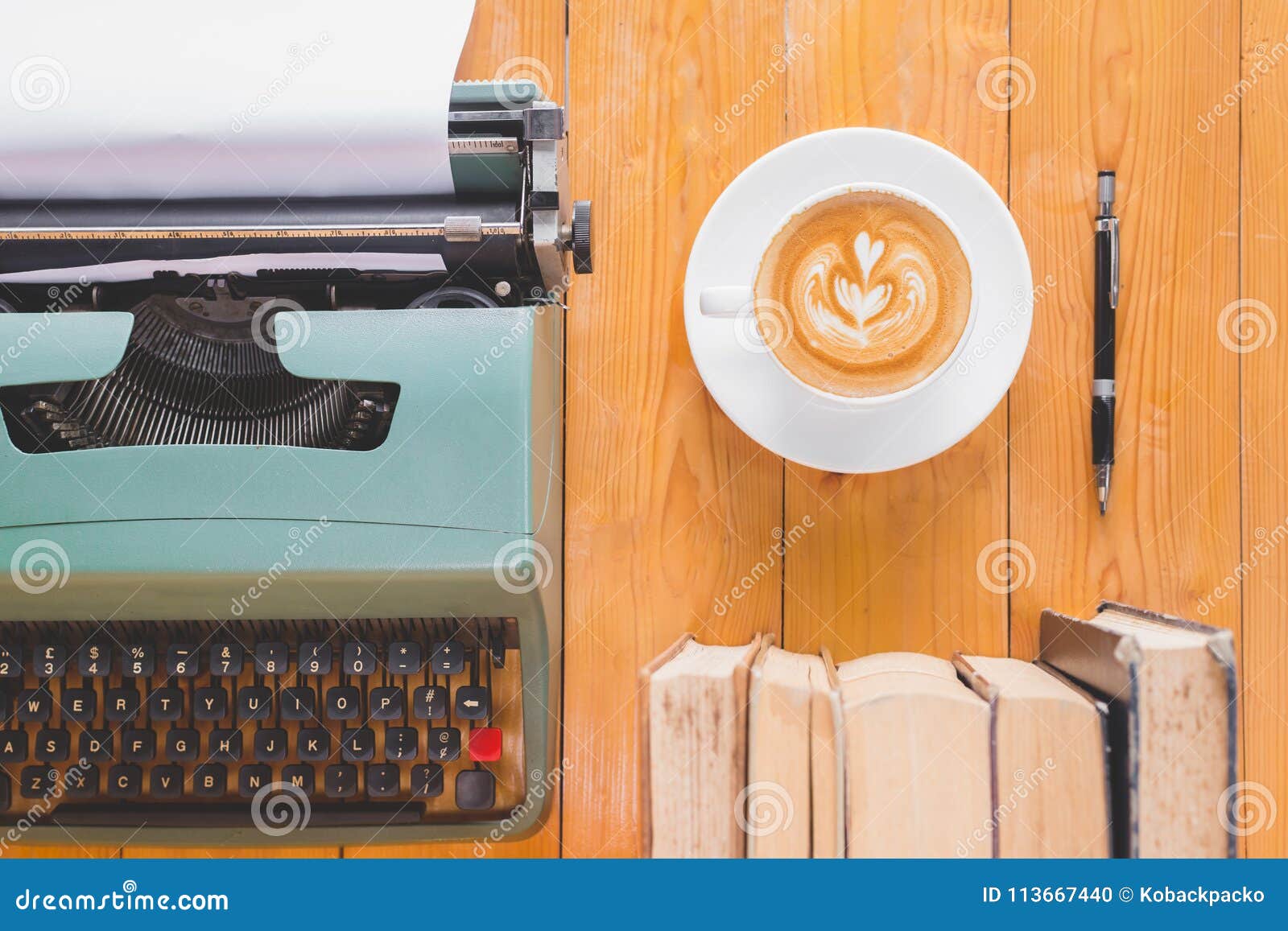 Typewriter with latte stock photo. Image of antique - 113667440