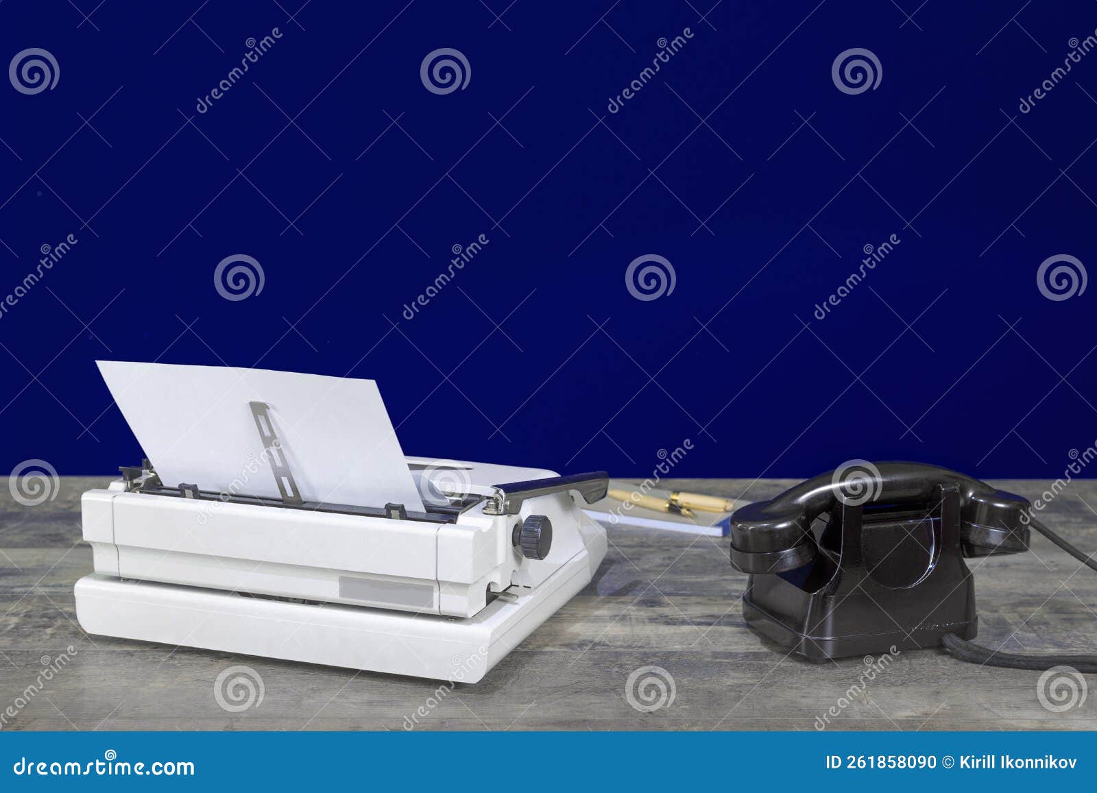 Typewriter, Old Telephone, Ink Pen and Notepad on a Textured Table ...