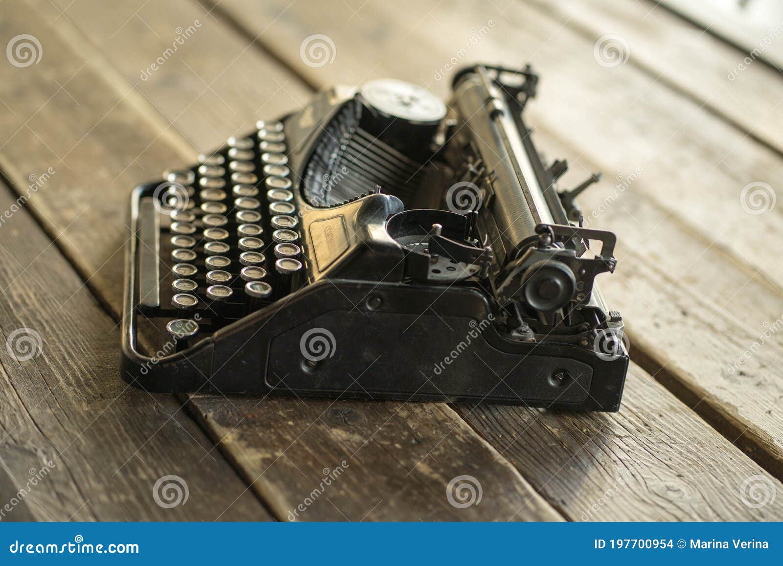 A Typewriter Stands on a Wooden Table Stock Photo - Image of black ...