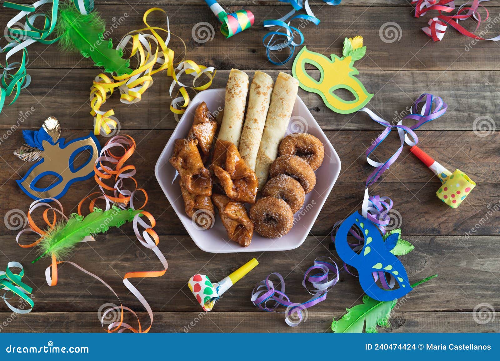 Typical Carnival Desserts with Carnival Decorations on a Wooden ...