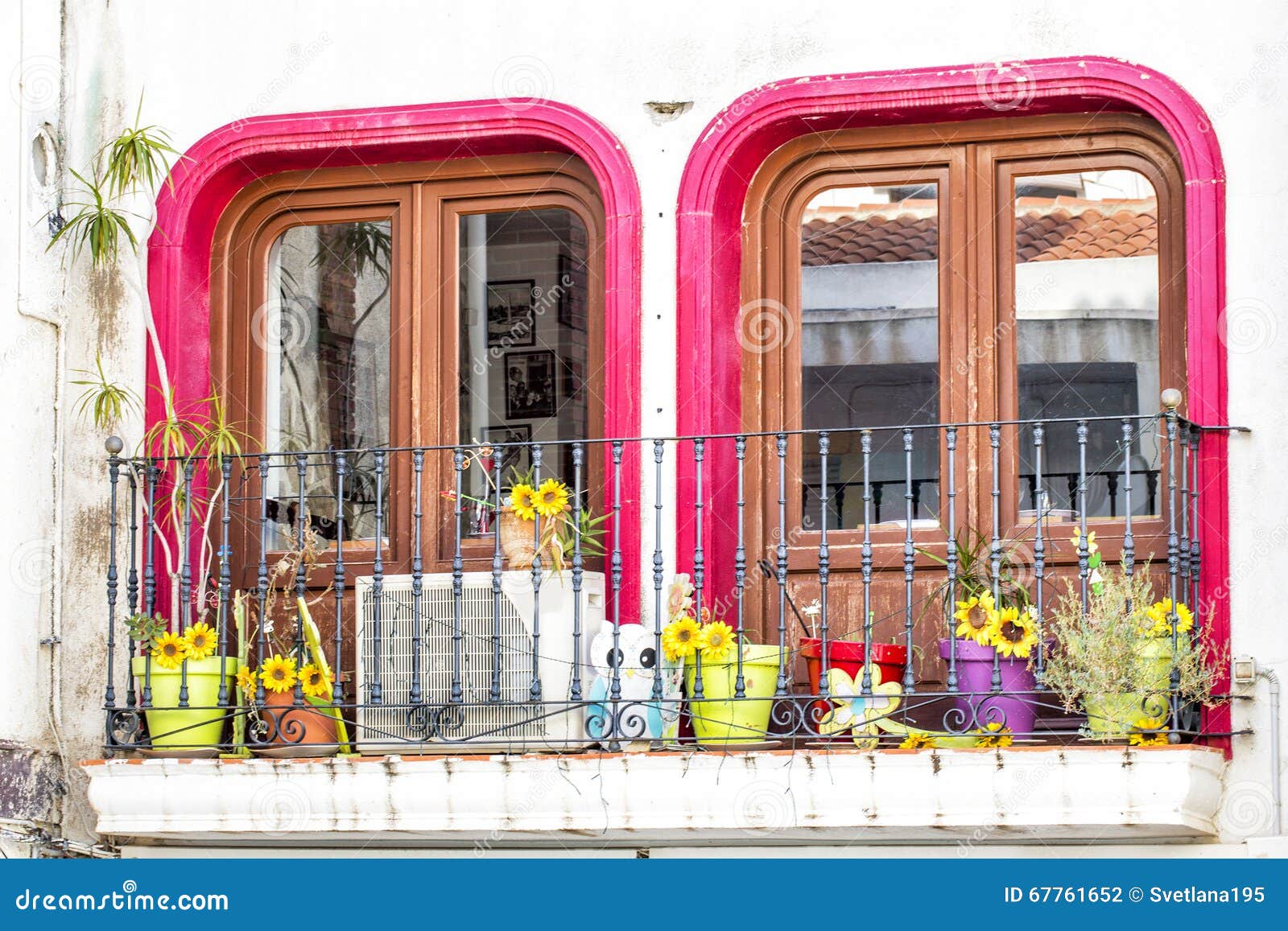 A Typical Decorative Balcony in Spain Stock Photo - Image of pink ...