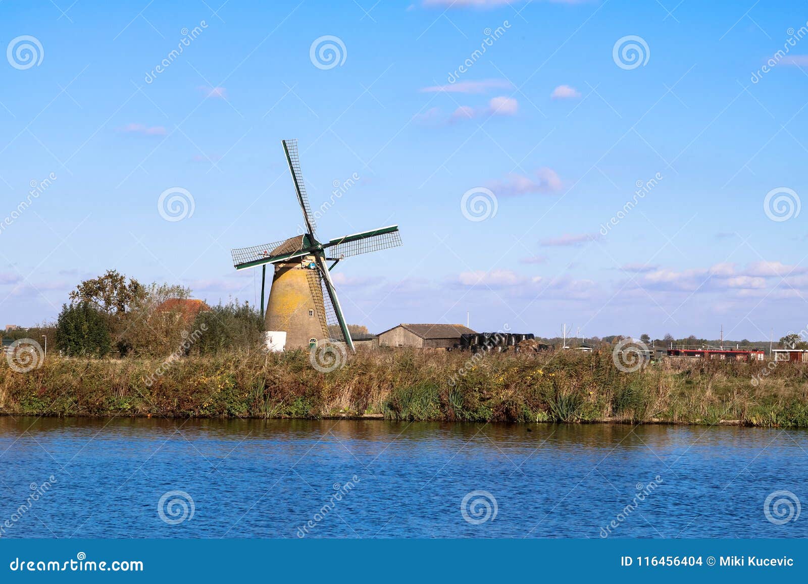 Dutch Scenery with an Old Mill Stock Photo - Image of heritage, park ...