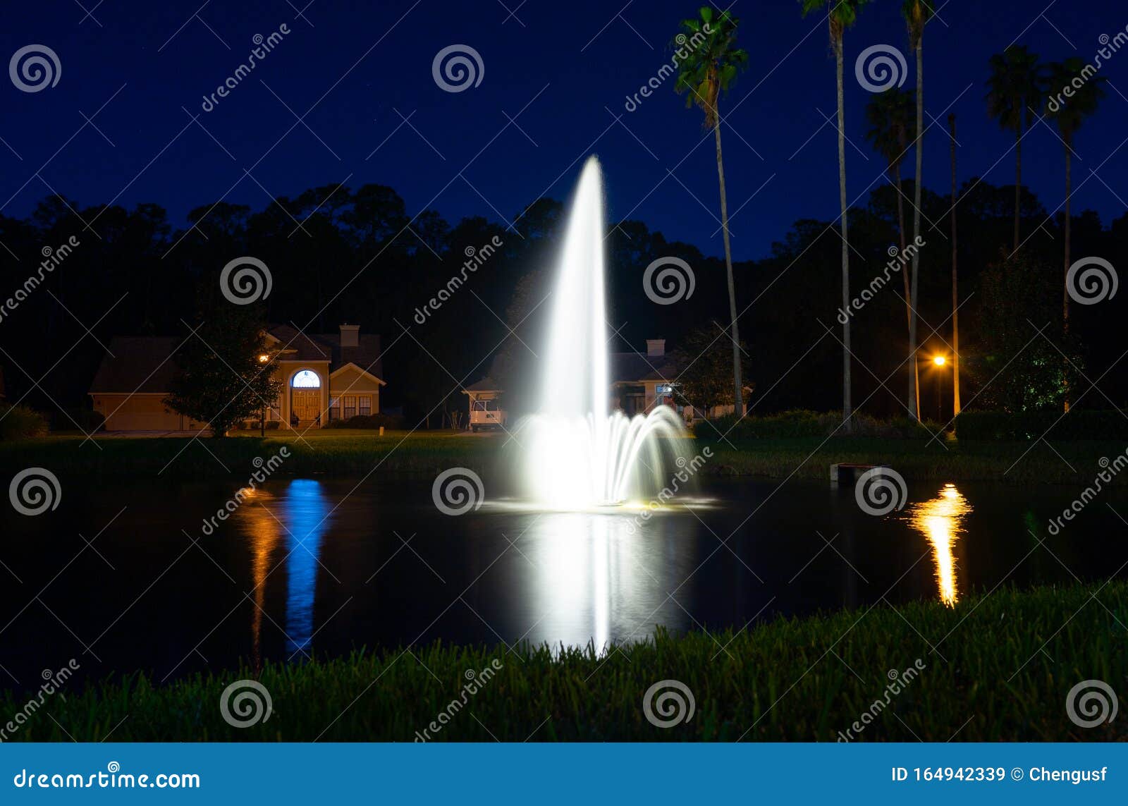 A Community Entrance at Night Stock Image - Image of estate, cloud ...