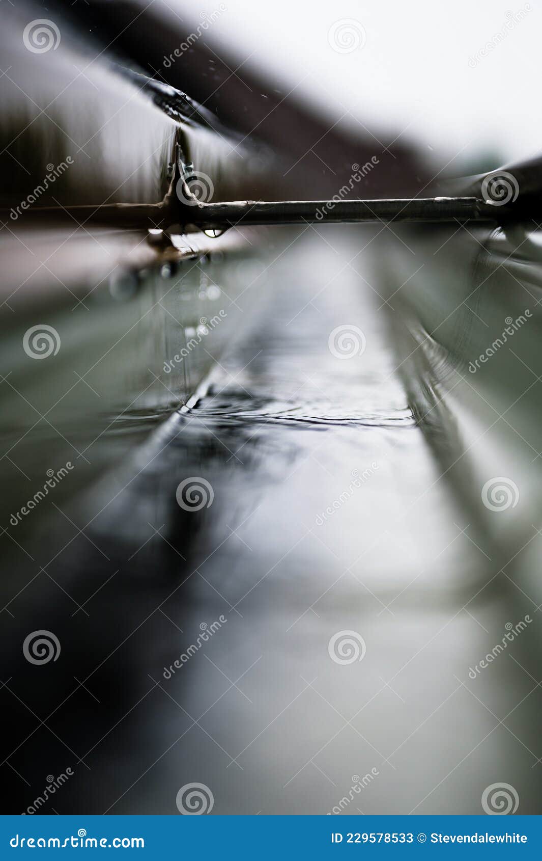 Selective Focus on a Section of Residential Guttering with Hanger ...