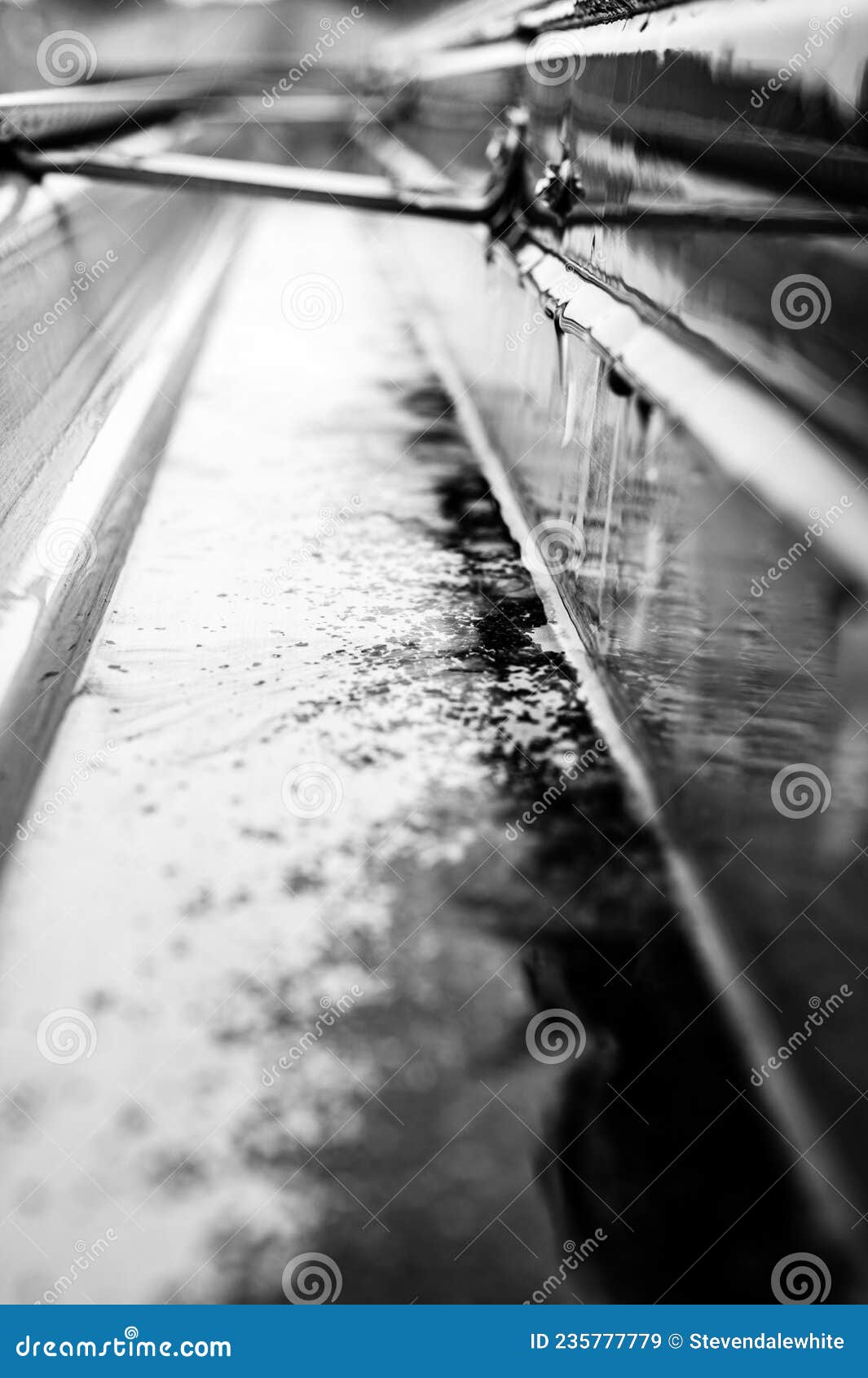 Selective Focus on a Section of Residential Guttering with Hanger ...