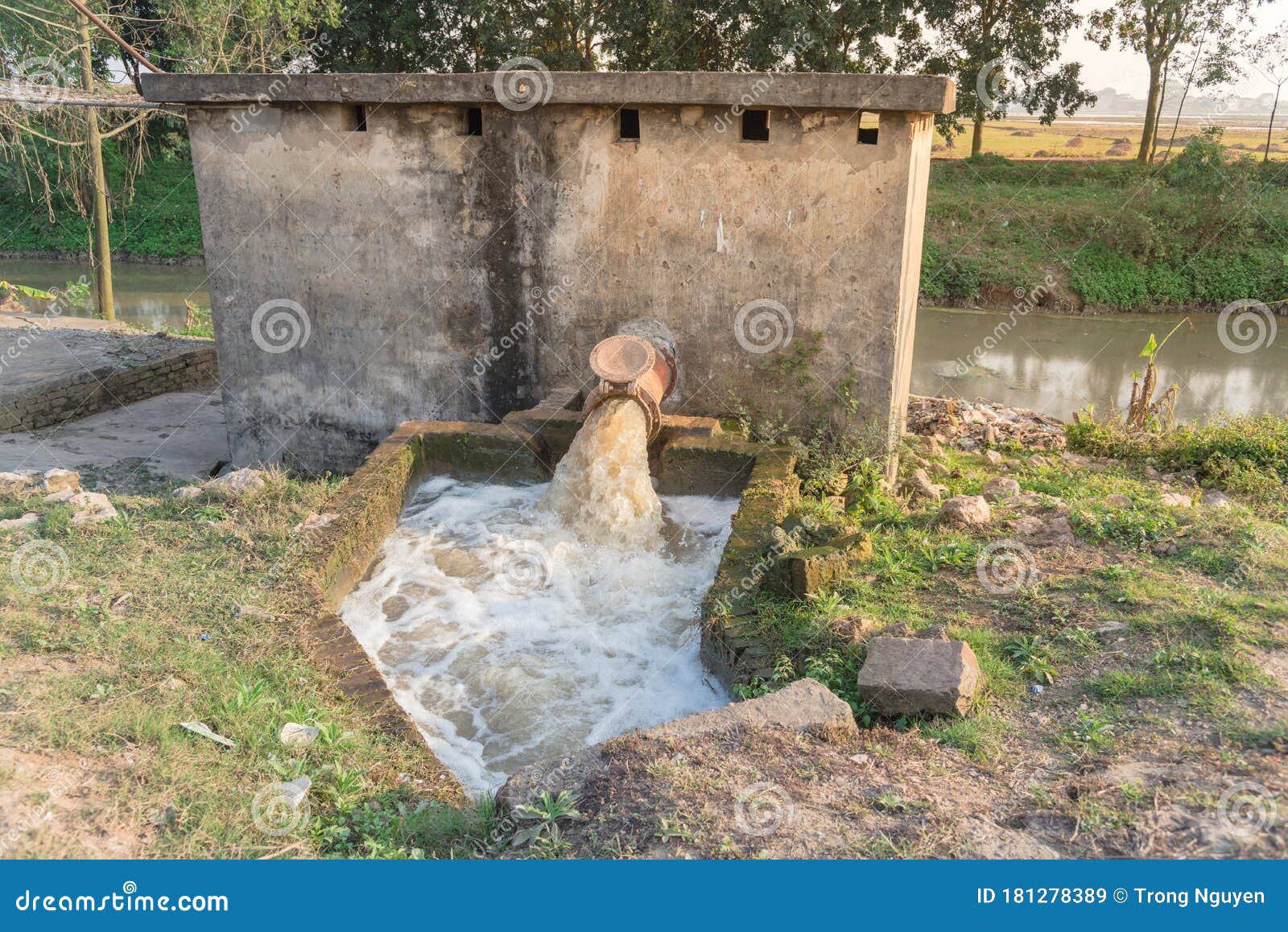 Typical Asian Irrigation Pumping System with Bubbles Flowing on Water ...