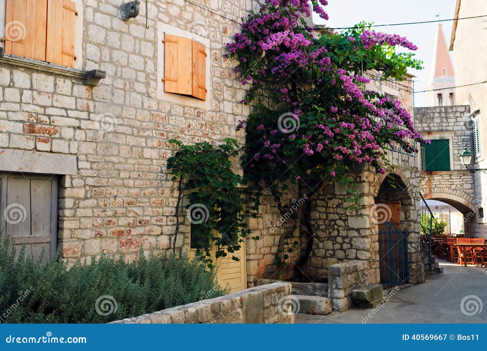 Mediterranean Homes Exterior With Brick And Stone Accents