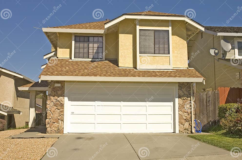 Typical modern tract home stock photo. Image of garage - 4774954