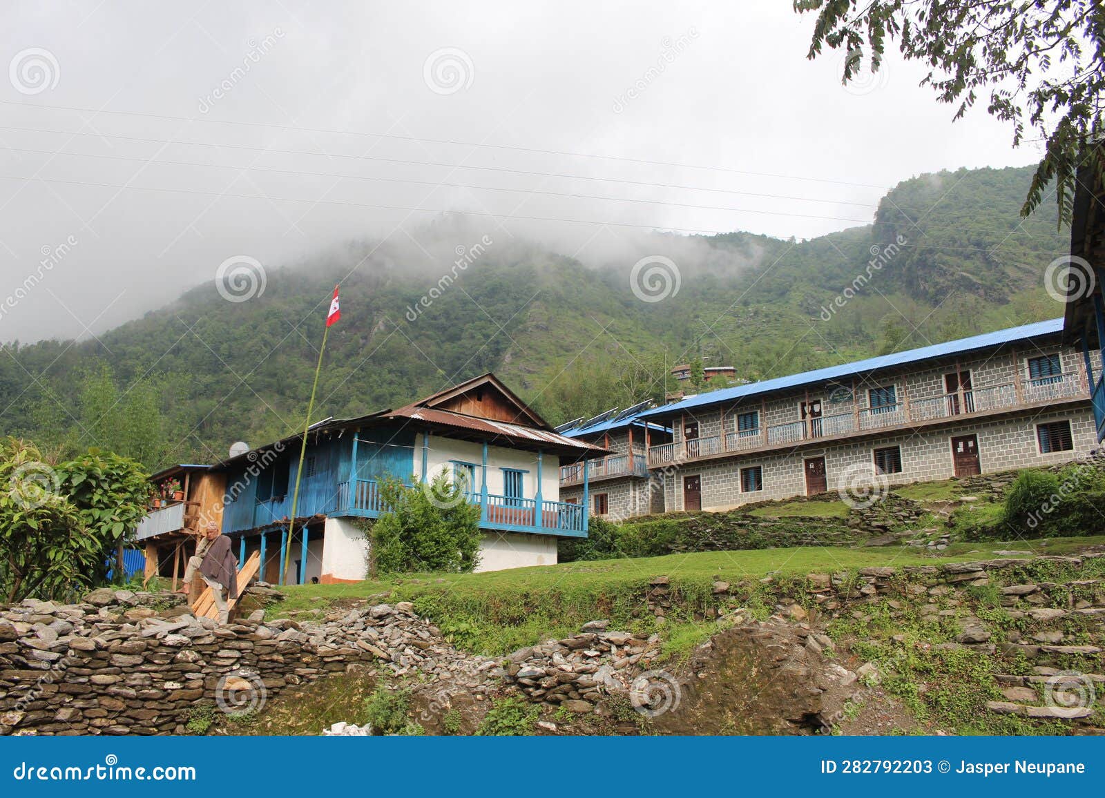 Typical Nepalese Houses Made Of Blocks With Flowers In Front Of Them In ...