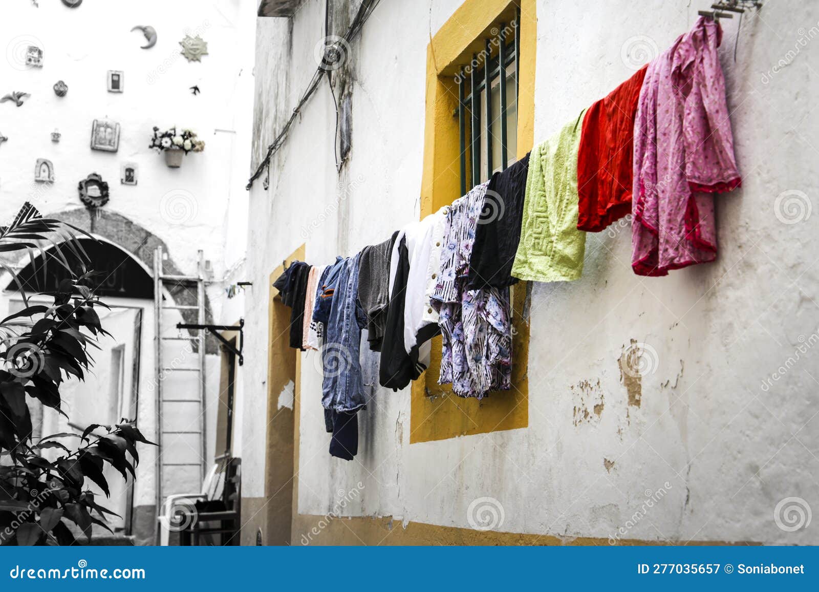 Typical Portuguese Window with Hanging Clothes Stock Image - Image of ...