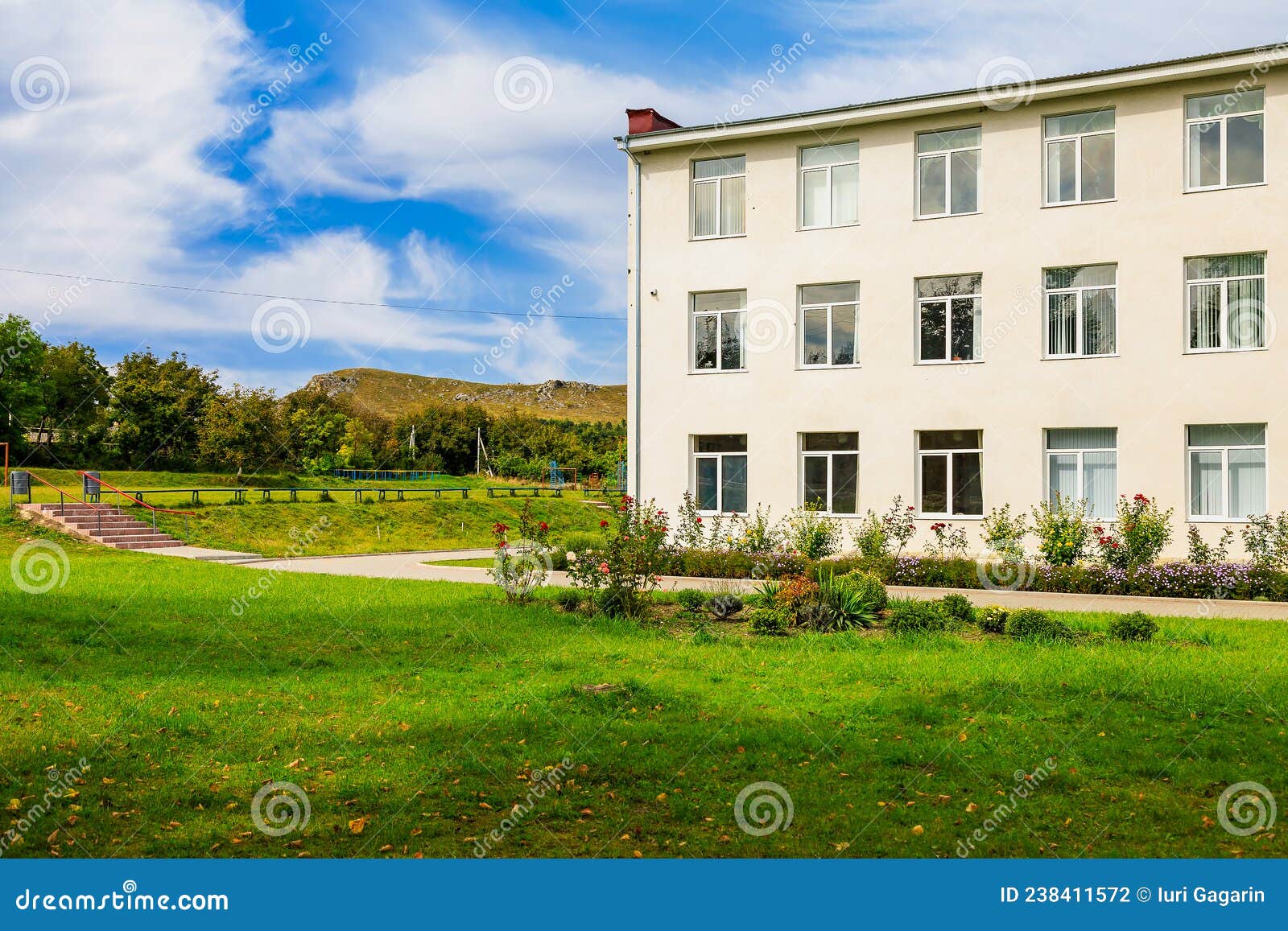 Typical School Building or Educational Institution. Background with ...