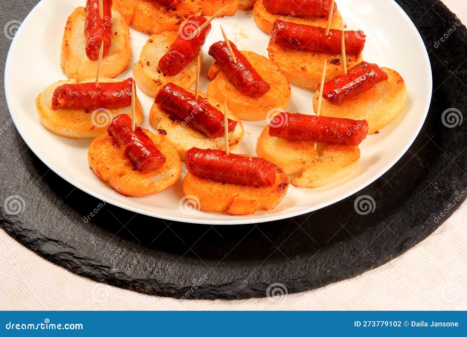 Typical Spanish Chorizo Tapas. Pork Sausage Called Chistorra on Bread ...