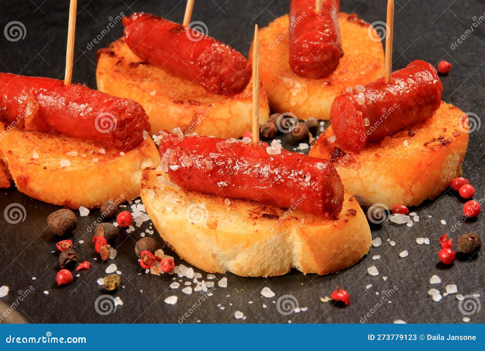Typical Spanish Chorizo Tapas. Pork Sausage Called Chistorra on Bread ...
