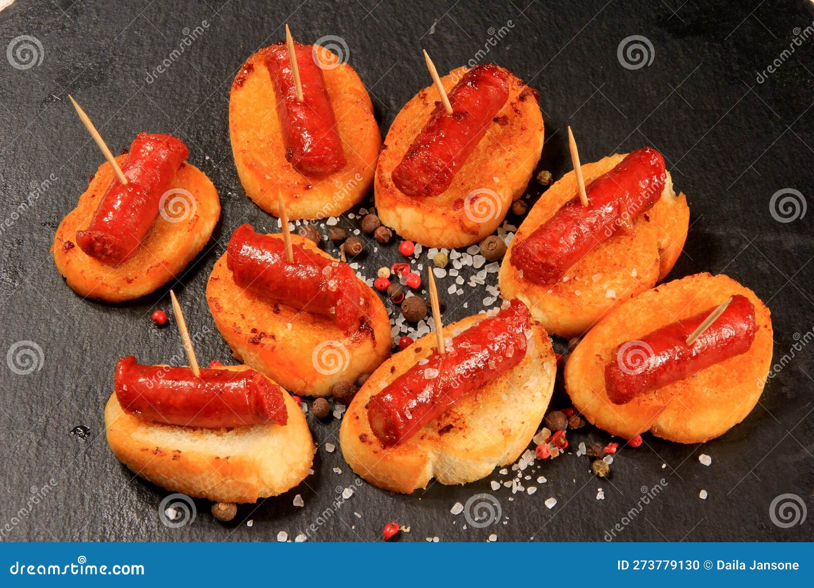 Typical Spanish Chorizo Tapas. Pork Sausage Called Chistorra on Bread ...