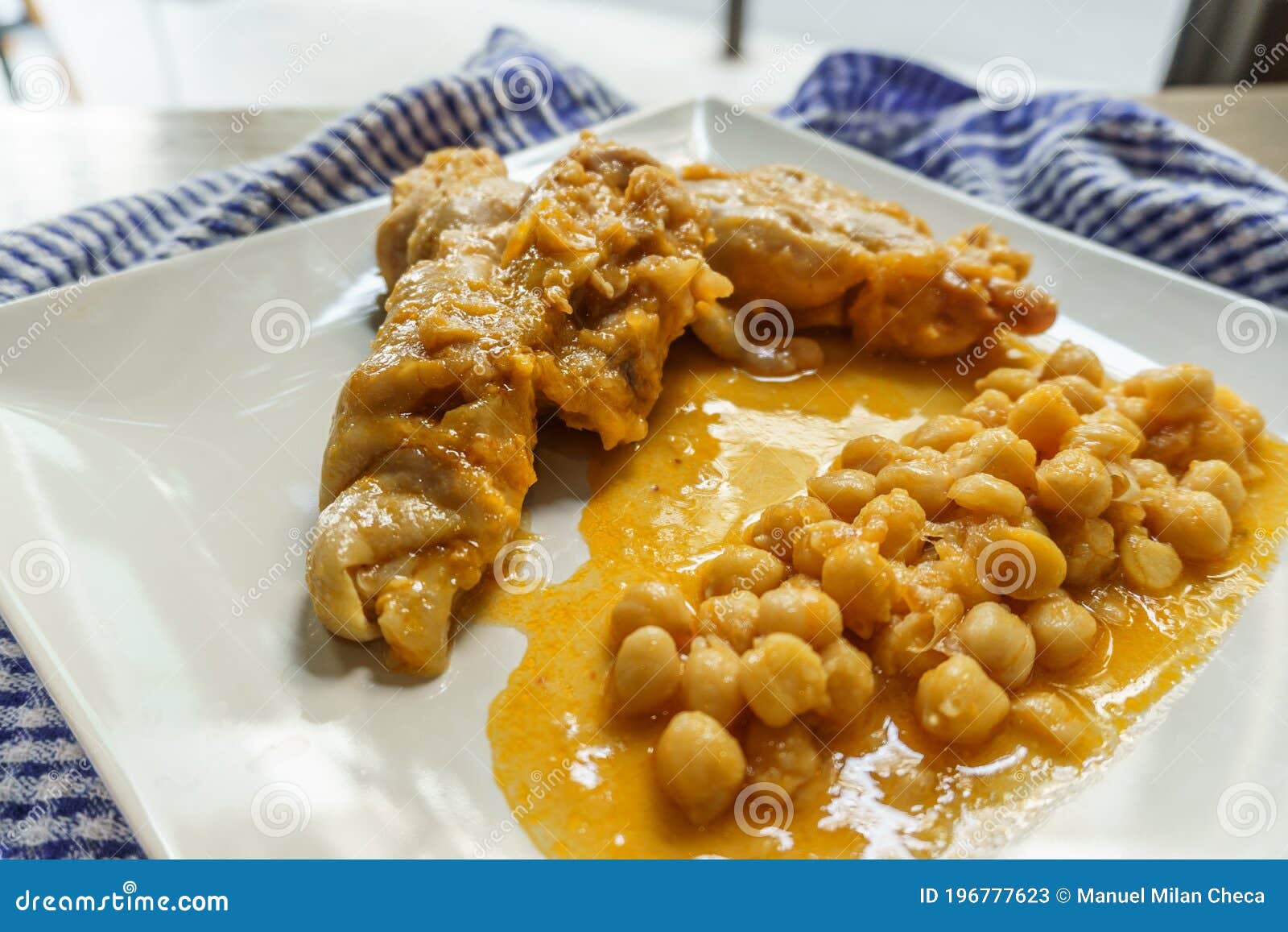 Typical Spanish Dish, Braised Pork Feet with Chickpeas Stock Image ...