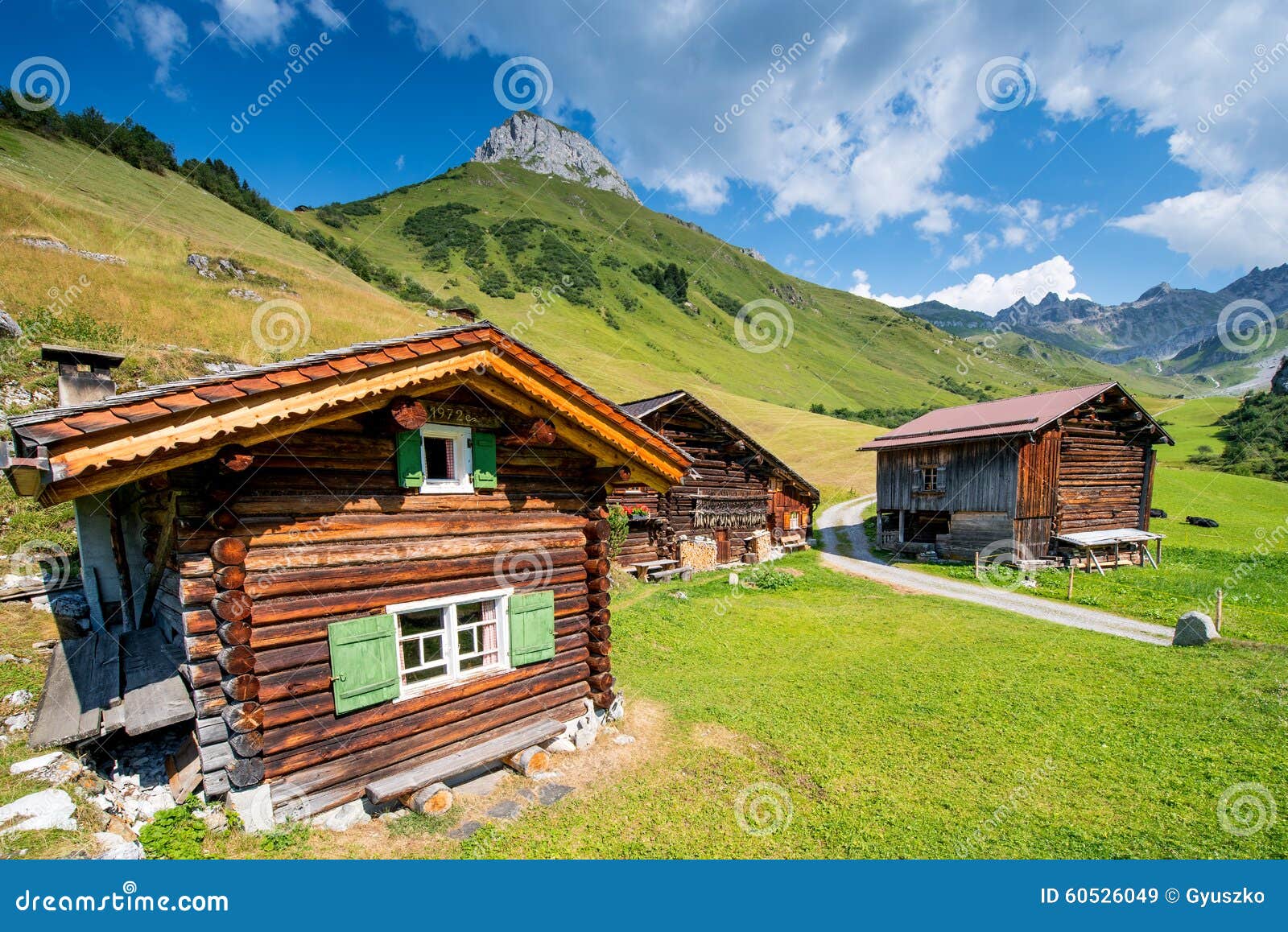 Typical Swiss Chalet stock image. Image of clouds, forest - 60526049