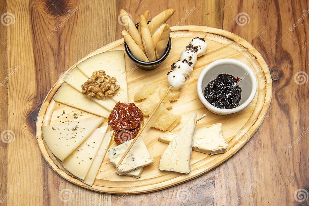 Typical Table of Assorted Cheeses Viewed from Above with Dried Tomato ...