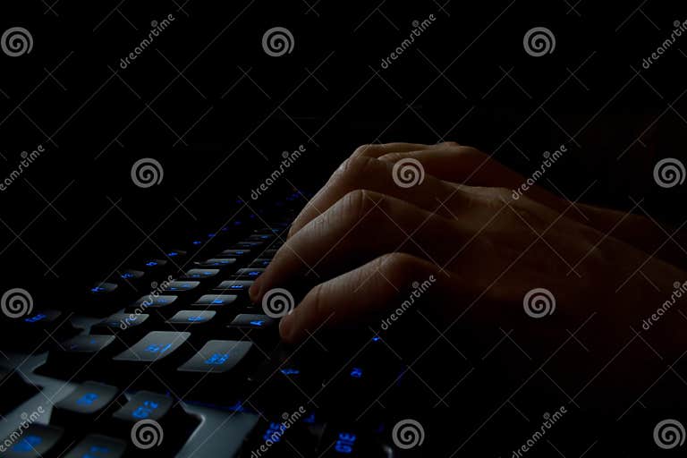 Typing on a Blue Neon Keyboard Stock Photo - Image of keyboard, buttons ...