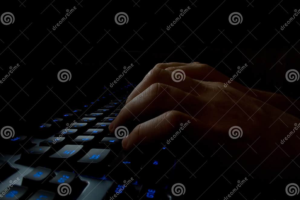 Typing on a Blue Neon Keyboard Stock Photo - Image of keyboard, buttons ...