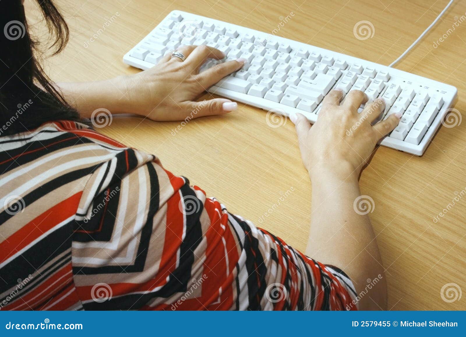 Typing on a keyboard stock image. Image of table, keys - 2579455