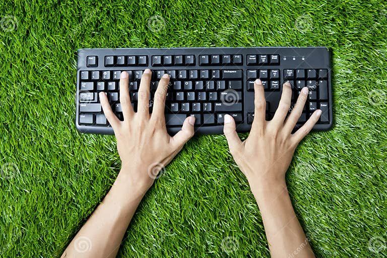 Typing keyboard on grass stock image. Image of electronics - 24208877