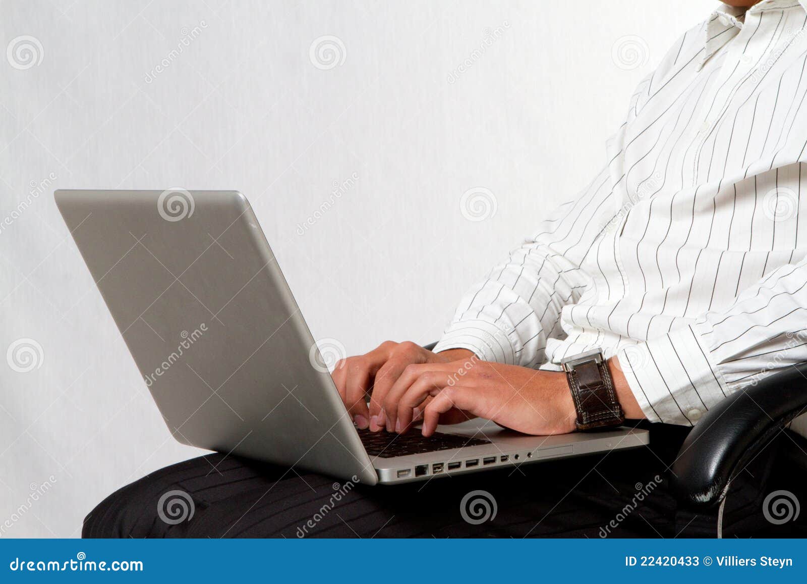 Typing on lap stock image. Image of caucasian, leather - 22420433